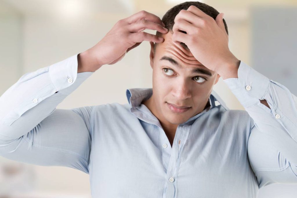 How Much Hair Loss is Normal? - Denver Hair Surgery - Blog